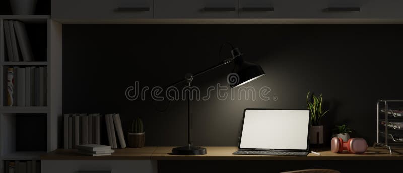 Work Space at Night with Open Laptop and Light from Table Lamp, Late ...
