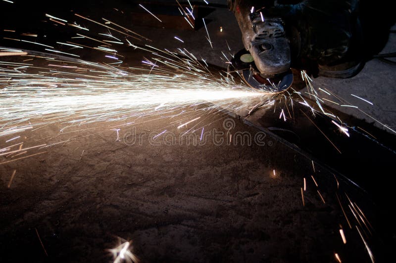 Work when the Spark Grinding Machine Stock Image - Image of holding ...