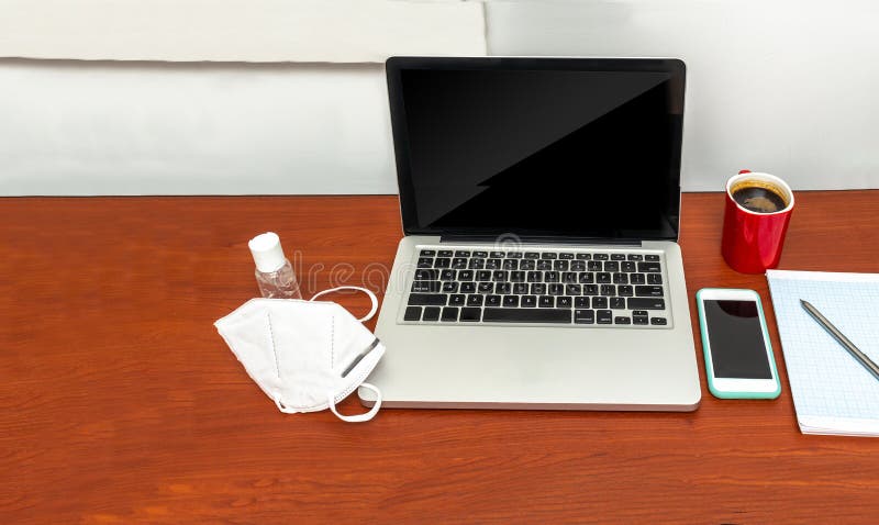 Work Station with Computer, Mask, Gel, Alcohol, Cell Phone, Notebook ...