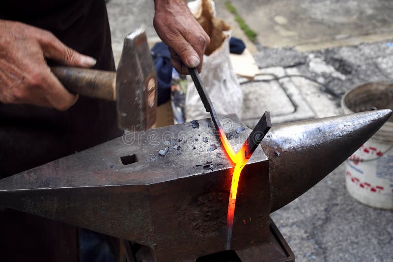 Work. Striking a Piece of Hot Iron Stock Image - Image of outdoors ...