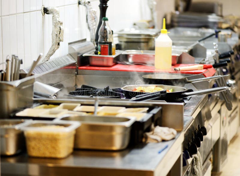 Work Surface and Kitchen Equipment in Professional Kitchen Stock Photo ...