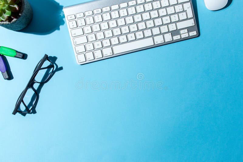 Work Table with Blue Background and Copy Spaces Editorial Stock Image ...