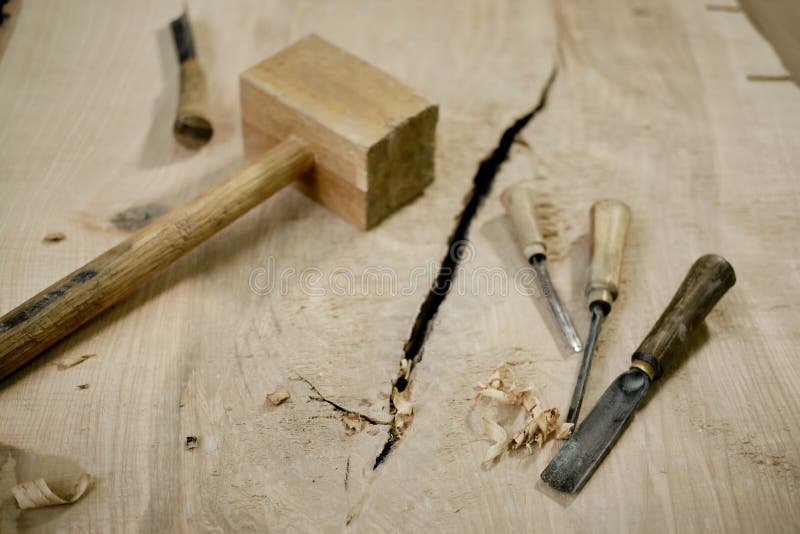 Work Table of a Carpenter with a Gouge and a Pile of Wood Chips. Stock ...