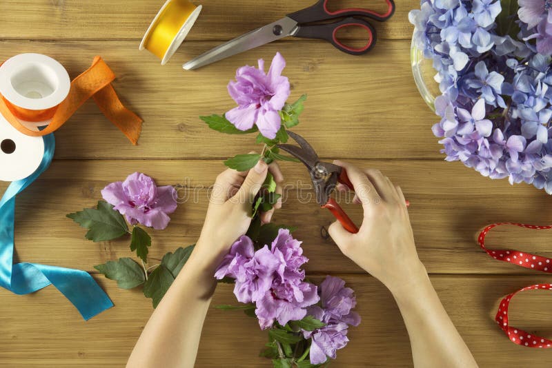 Work Table of Florist Woman Stock Photo - Image of leaves, scissors ...
