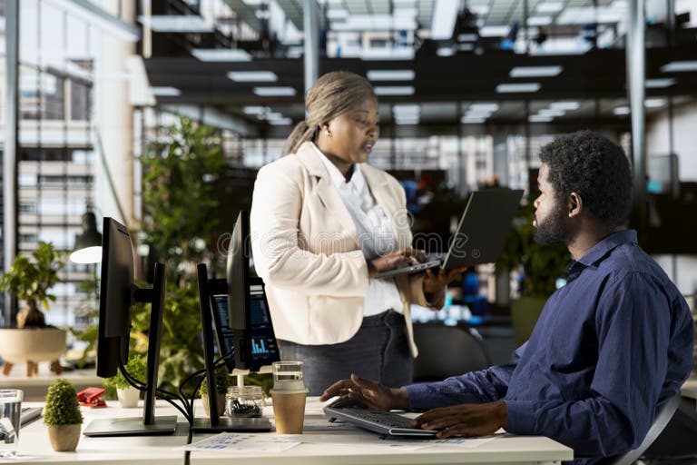 Work Team in the Office Engaged in Infographics Analysis for Problem Solving Stock Image - Image ...