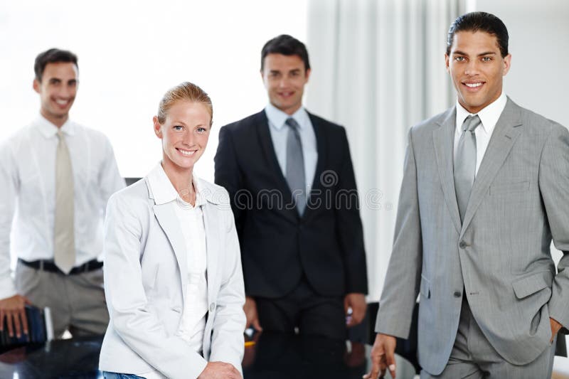 They Work Together with a Smile. a Professional Business Team Standing ...