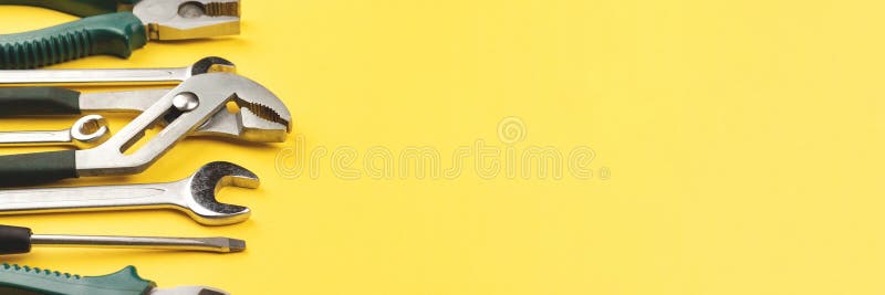 Work Tools on Bright Yellow Background Banner. Panoramic Web Header ...
