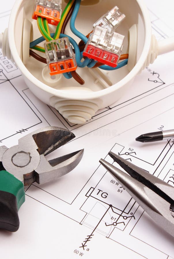 Work Tools and Electrical Box with Cables on Construction Drawing of ...