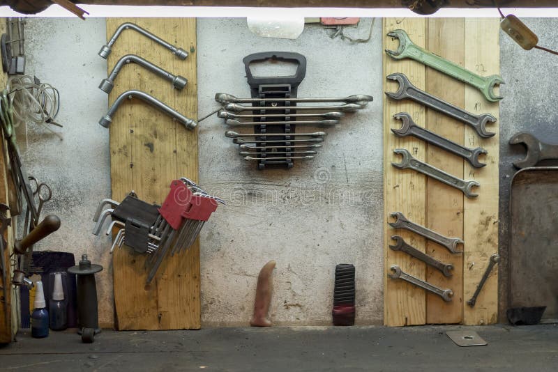 Work Tools on the Garage Wall and Work Table Stock Photo - Image of ...