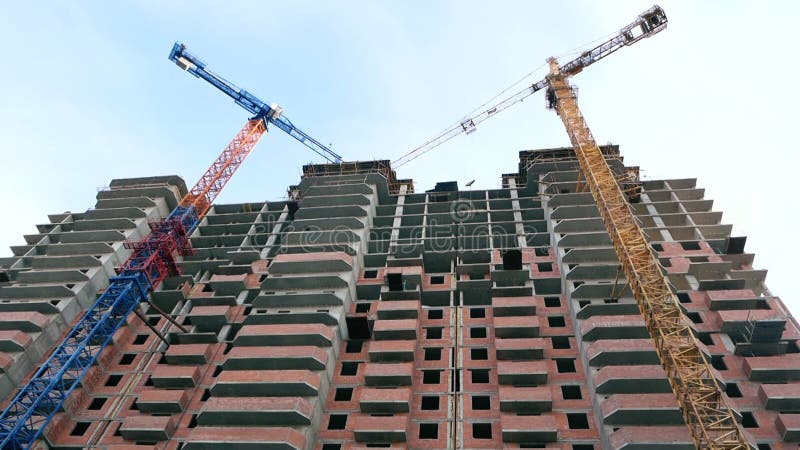 Work of a Tower Crane at the Construction Site of a Multi-storey ...