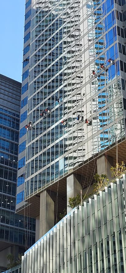 Work Vertically in Day Light. Stock Image - Image of metropolis ...