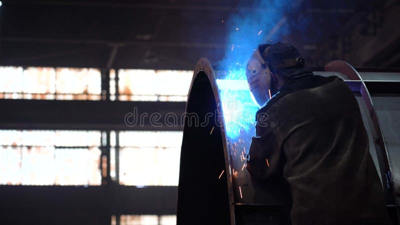 The Work of the Welder. Welding Work in the Factory Floor Stock Footage ...