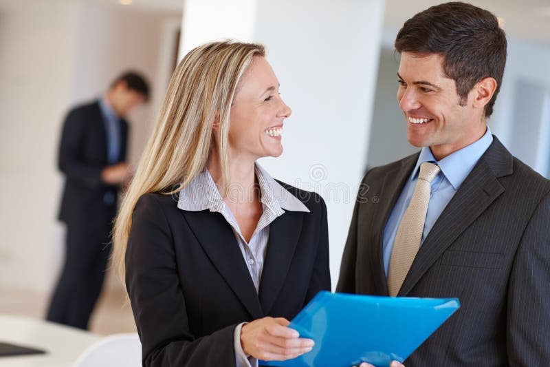 They Work Well Together. Two Business Professionals Discussing a ...