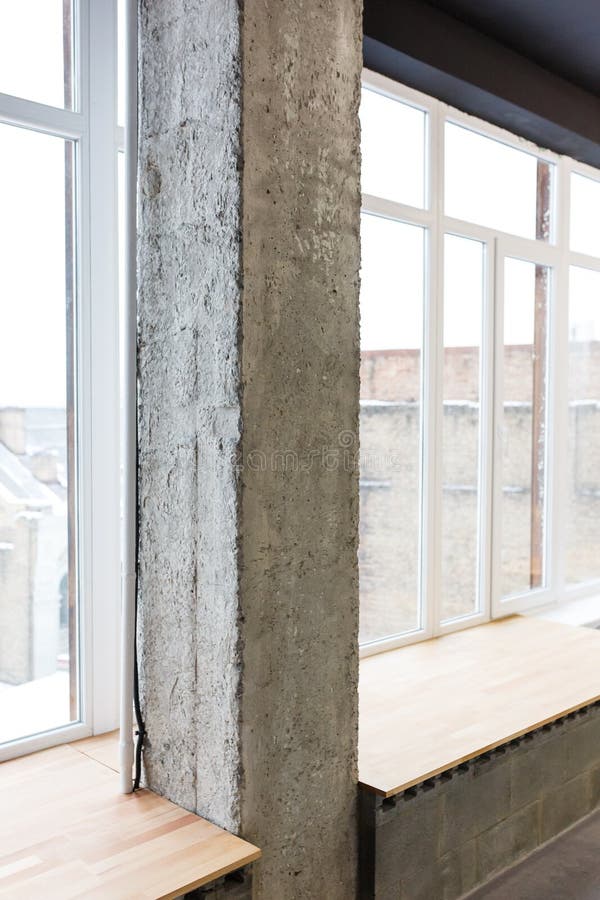 Work Zone in the Office in a Loft Style with a Concrete Column, Light ...