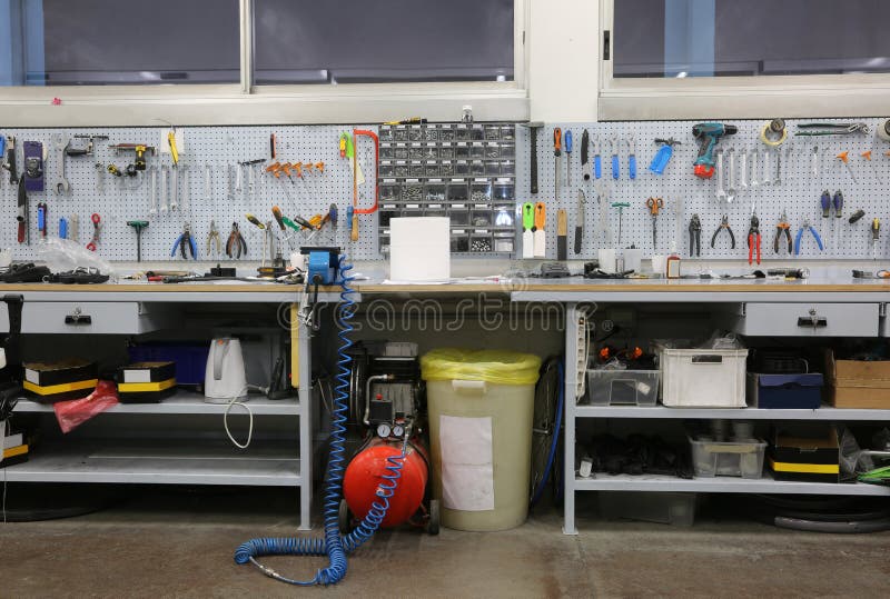 Workbench with Many Tools Inside a Mechanic Workshop Specialized Stock ...