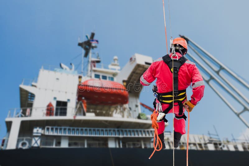 Worker Abseiling and Rope Access Sprinkle on High Place Stock Image ...