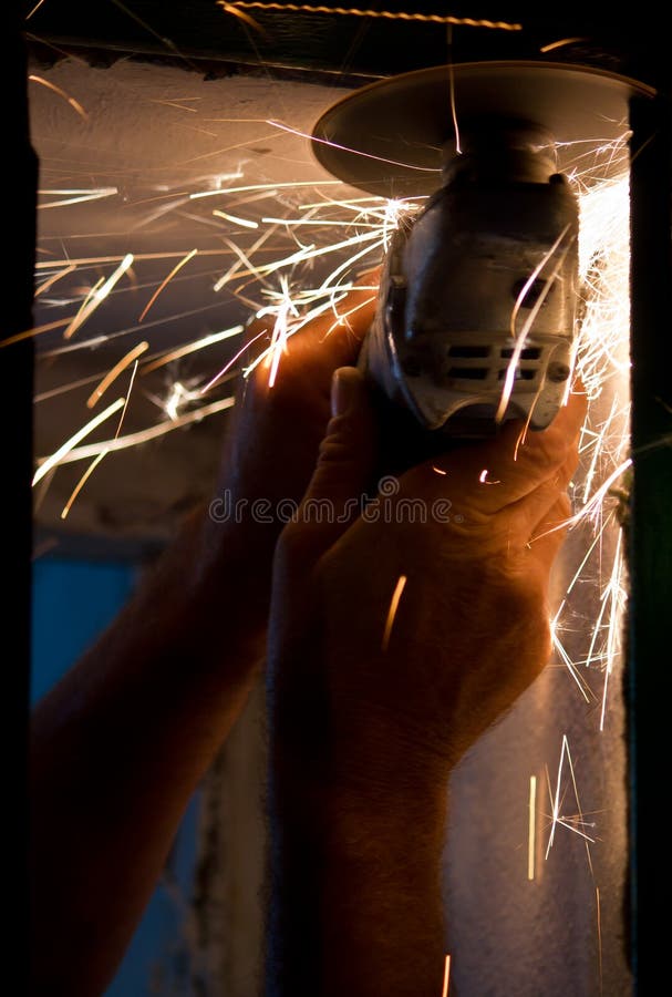 Worker with angle grinder stock image. Image of iron - 23237591