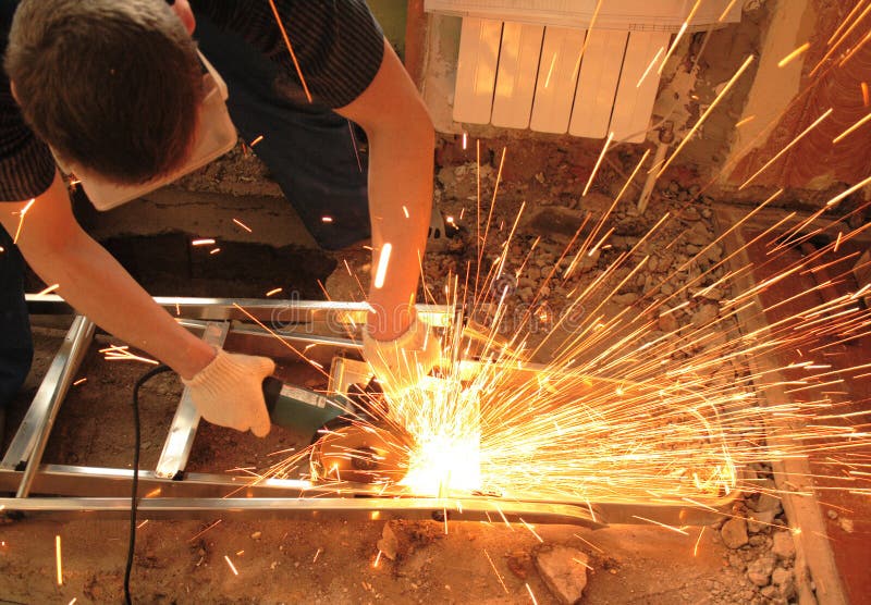 The Worker with Angle Grinder Stock Photo - Image of glove, power: 4211094