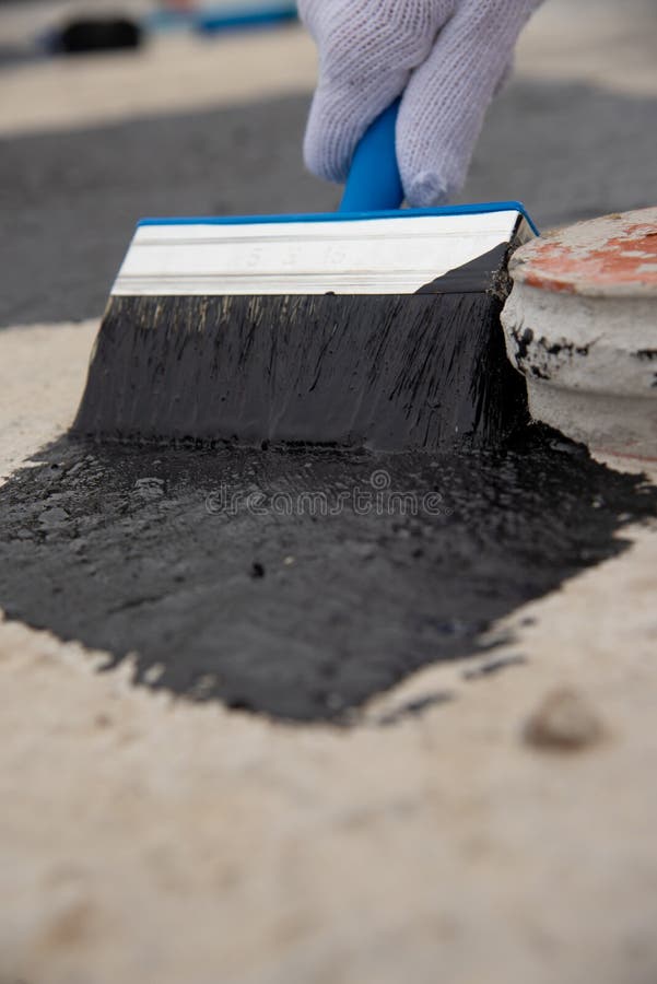 Worker Applies Bitumen Mastic on the Foundation Stock Photo - Image of ...