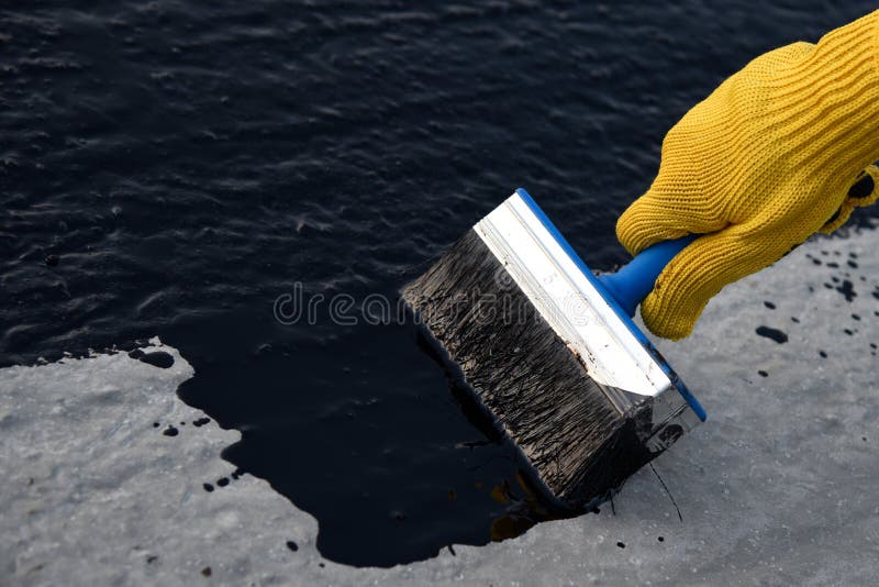 Worker Applies Bitumen Mastic on the Foundation Stock Photo - Image of ...