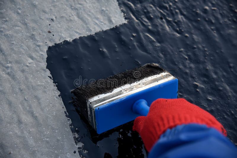 Worker Applies Bitumen Mastic on the Foundation Stock Photo - Image of ...