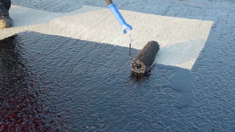 Worker Applies Bitumen Mastic on the Foundation Stock Video - Video of ...