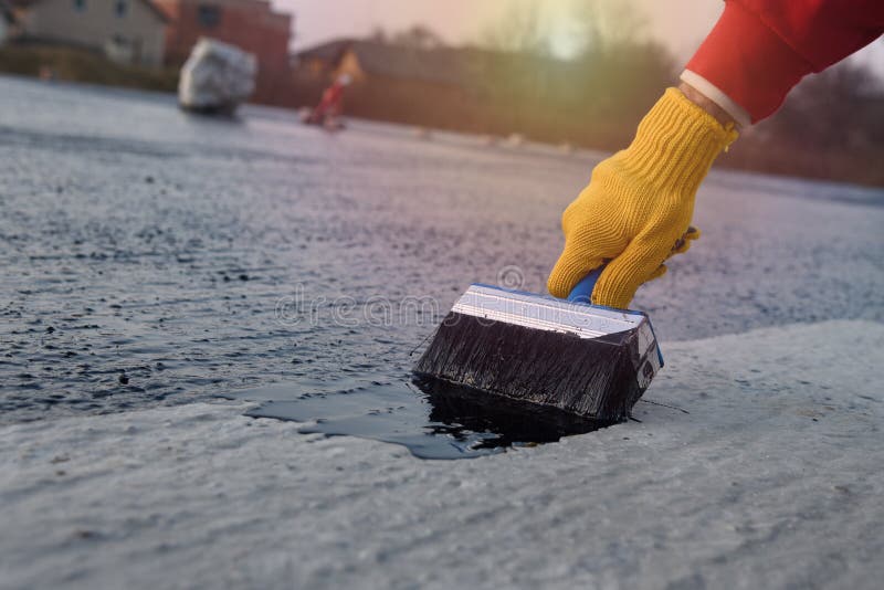 Worker Applies Bitumen Mastic on the Foundation Stock Photo - Image of ...