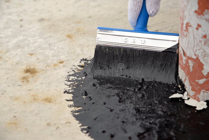 Worker Applies Bitumen Mastic on the Foundation Stock Photo - Image of ...