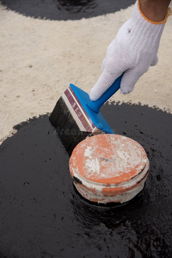 Worker Applies Bitumen Mastic on the Foundation Stock Photo - Image of ...