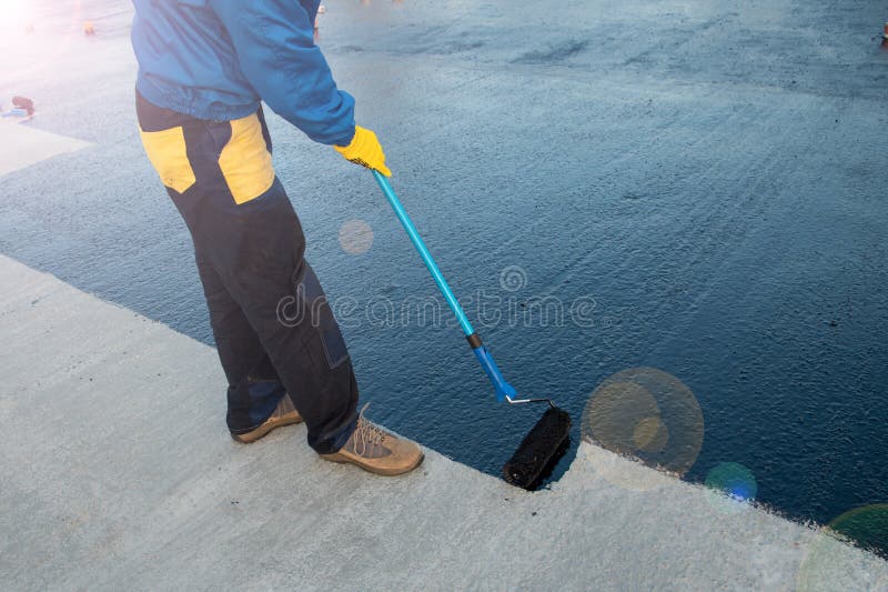 Worker Applies Bitumen Mastic on the Foundation Stock Image - Image of ...