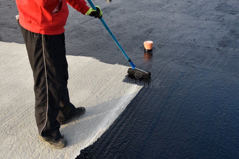 Worker Applies Bitumen Mastic on the Foundation Stock Photo - Image of ...