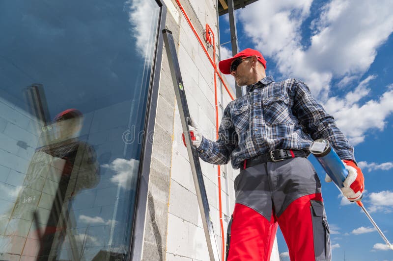 Worker Applies Sealant Building Window Construction Stock Photos - Free ...