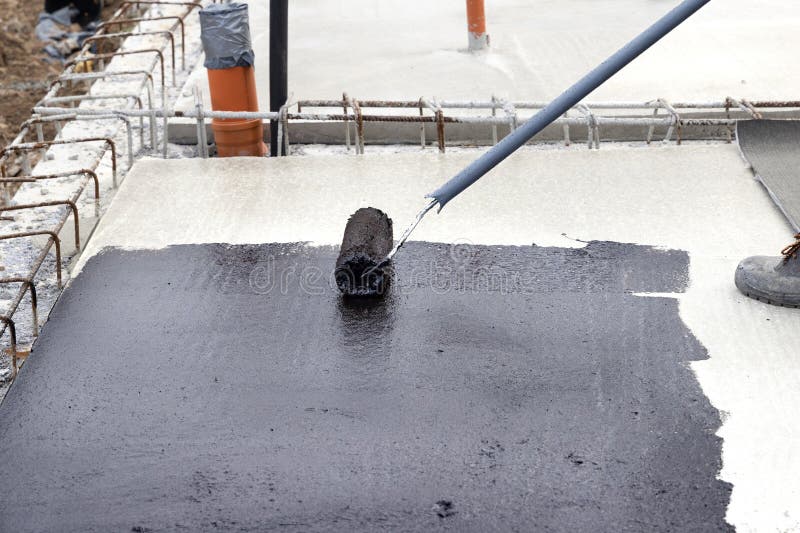 Laying of Waterproofing Sheathing and Insulation on a Roof Stock Photo ...