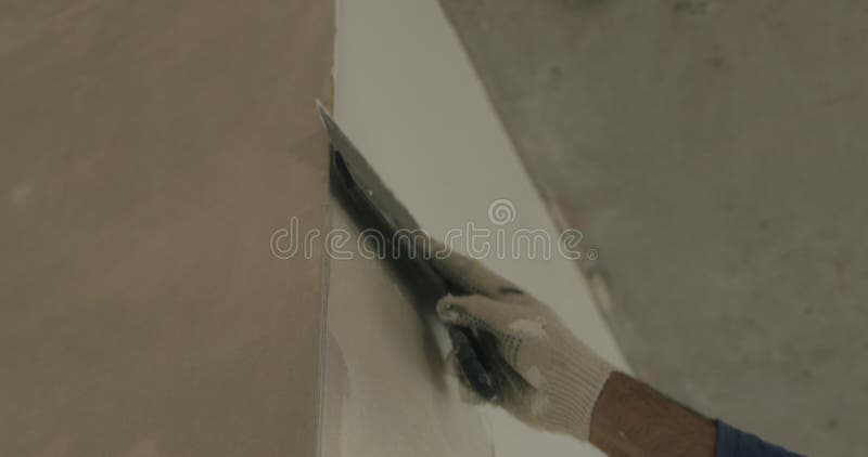 Worker Applying Putty on the Wall Near Corner Stock Photo - Image of ...