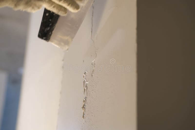 Worker Applying Putty on the Wall with Putty Knife Stock Image - Image ...