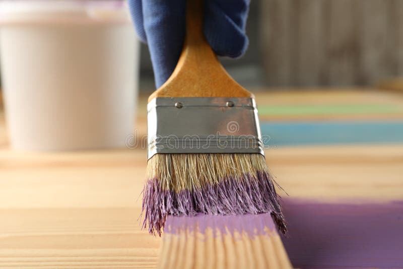 Worker Applying Violet Paint Onto Wooden Surface, Closeup Stock Image ...