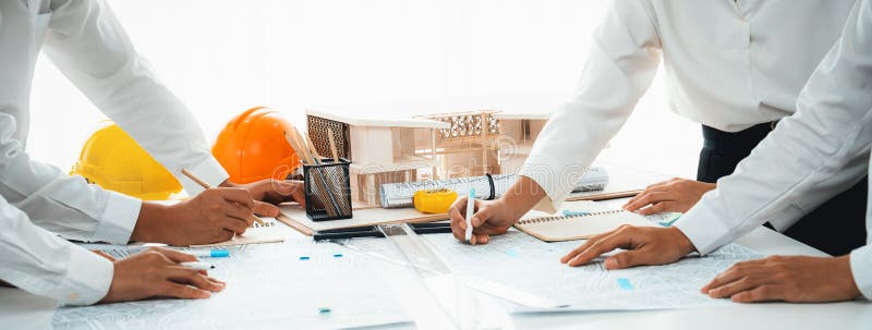 Worker, Architect and Engineer Work on Real Estate Construction Project ...
