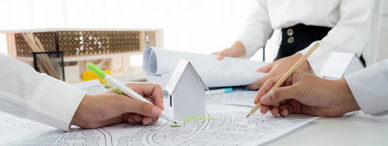 Worker, Architect and Engineer Work on Real Estate Construction Project ...