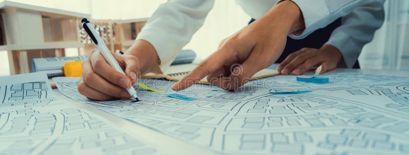 Worker, Architect and Engineer Work on Real Estate Construction Project ...