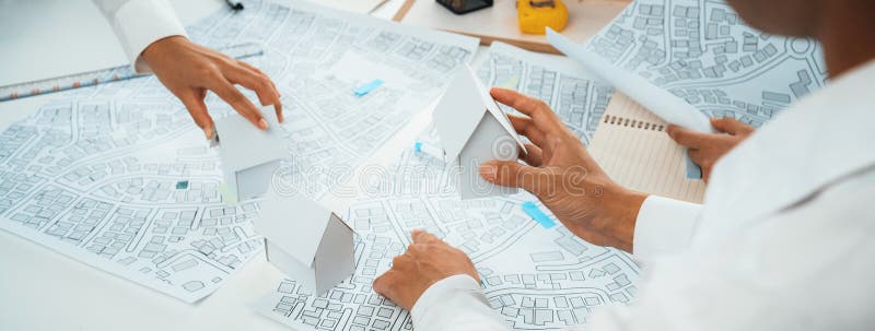 Worker, Architect and Engineer Work on Real Estate Construction Project ...