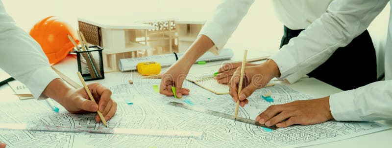 Worker, Architect and Engineer Work on Real Estate Construction Project ...