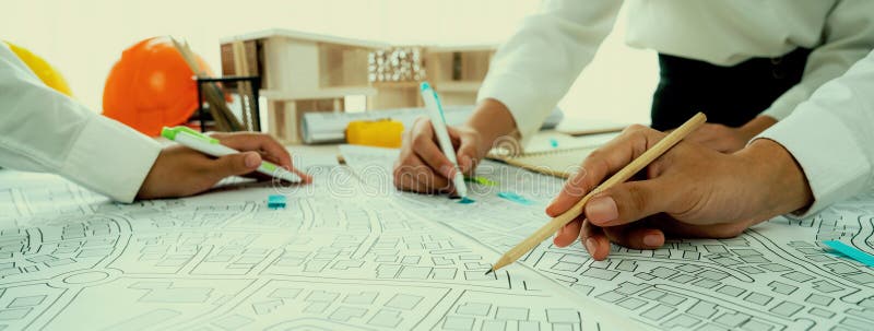 Worker, Architect and Engineer Work on Real Estate Construction Project ...