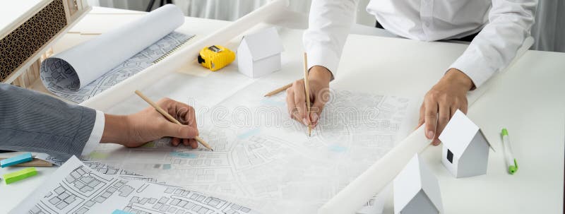 Worker, Architect and Engineer Work on Real Estate Construction Project ...