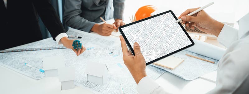 Worker, Architect and Engineer Work on Real Estate Construction Project ...