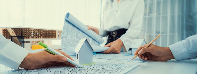 Worker, Architect and Engineer Work on Real Estate Construction Project ...