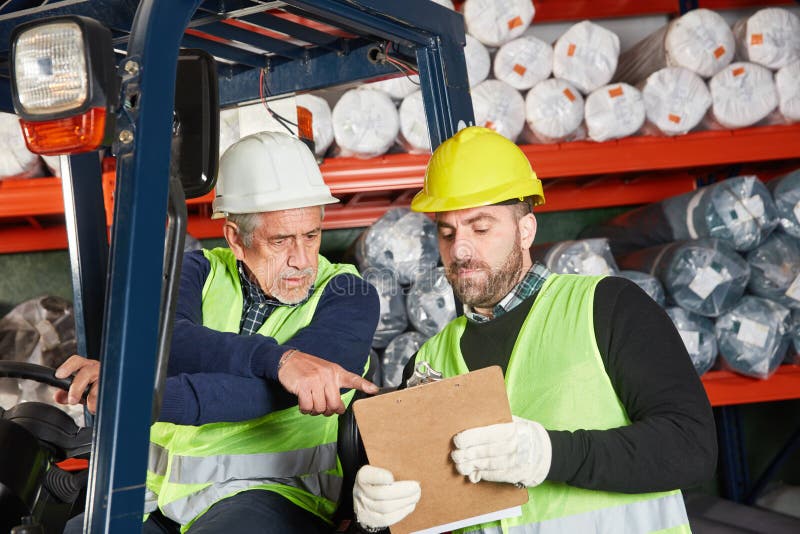 Worker As Forklift Driver and Colleague Stock Image - Image of charge ...