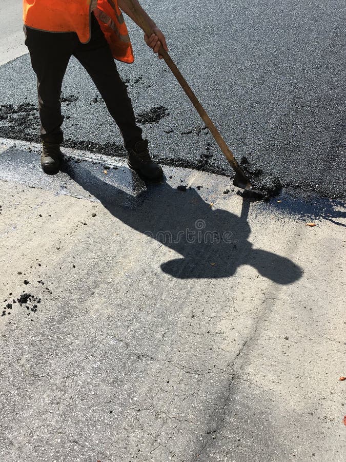 A Worker Asphalt Road in the Summer Stock Photo - Image of outdoor ...