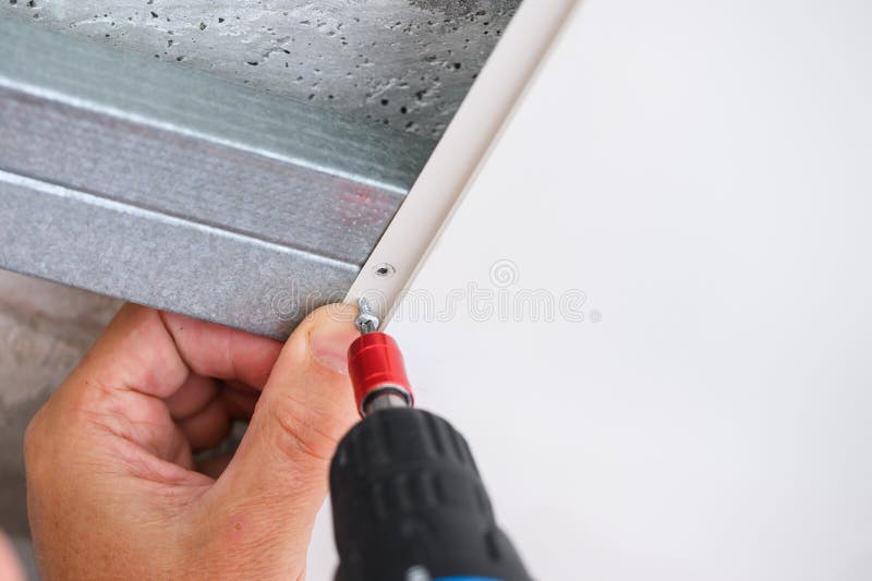 Worker Assemble Suspended Ceiling Fixing Panel Screwdriver Stock Photos ...