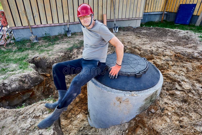 Worker Assembled Second Chamber of Septic Tank from Concrete Rings and ...