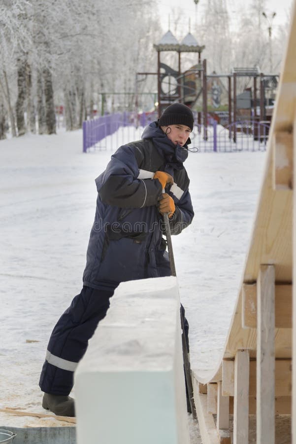 Worker Assembler Crowbar Moves the Ice Block Stock Photo - Image of ...